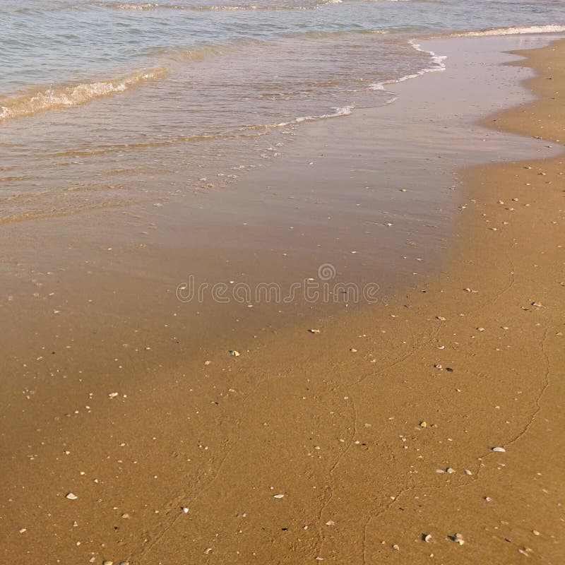 Beach and waves stock image. Image of golden, shallow - 126745083