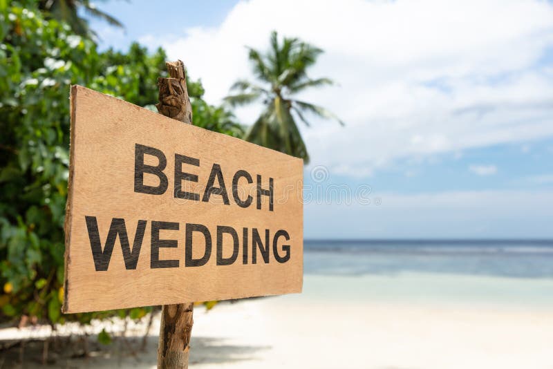 Beach Wedding Wooden Post on Beach Stock Photo - Image of billboard ...