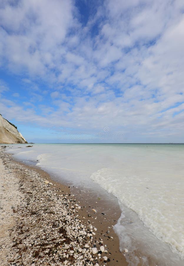 Beach with the White Waters of the Baltic Sea and the Cliffs in Denmark ...