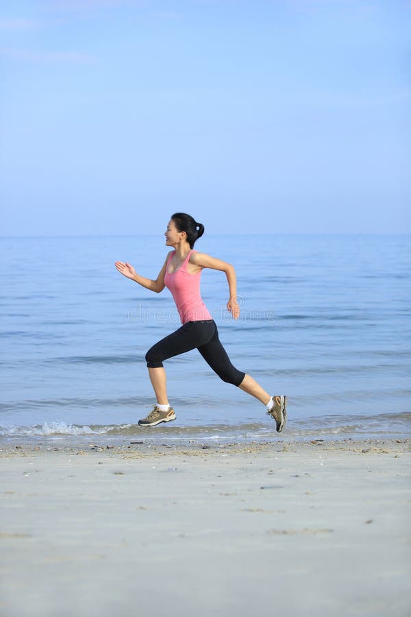 Beach woman running stock image. Image of healthy, female - 33655403