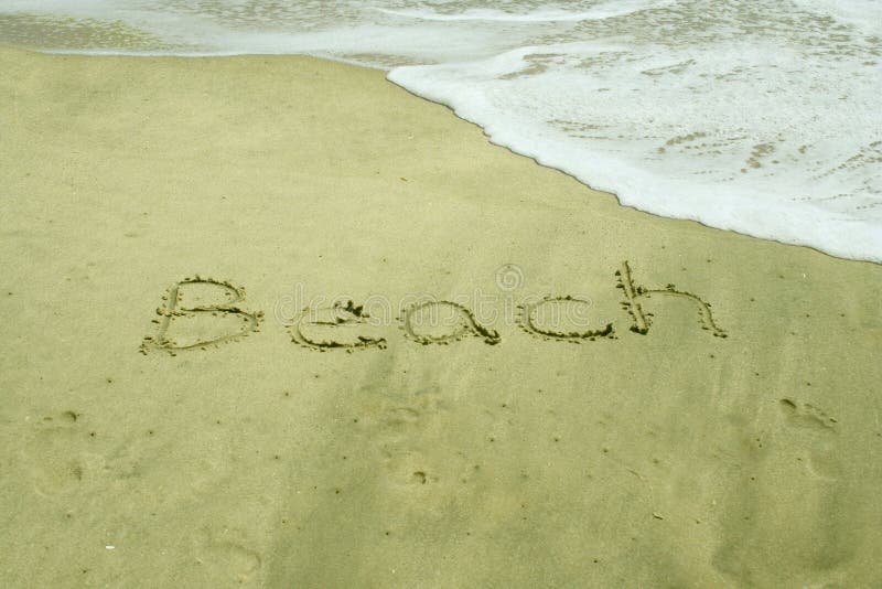 Beach written in sand stock photo. Image of water, summer - 3135312