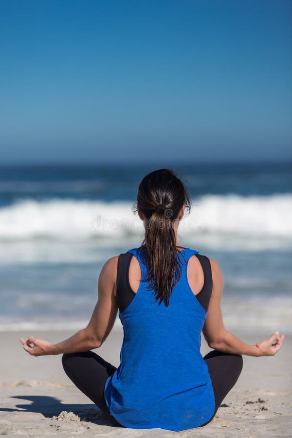 Beach Yoga stock photo. Image of beautiful, blue, beach - 73629126