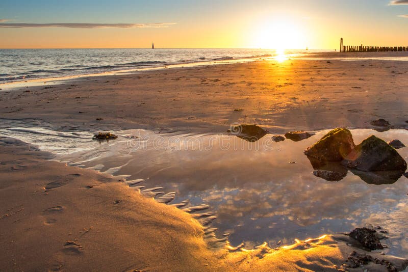 Beach, Zeeland stock photo. Image of dishoek, sunset - 96027832