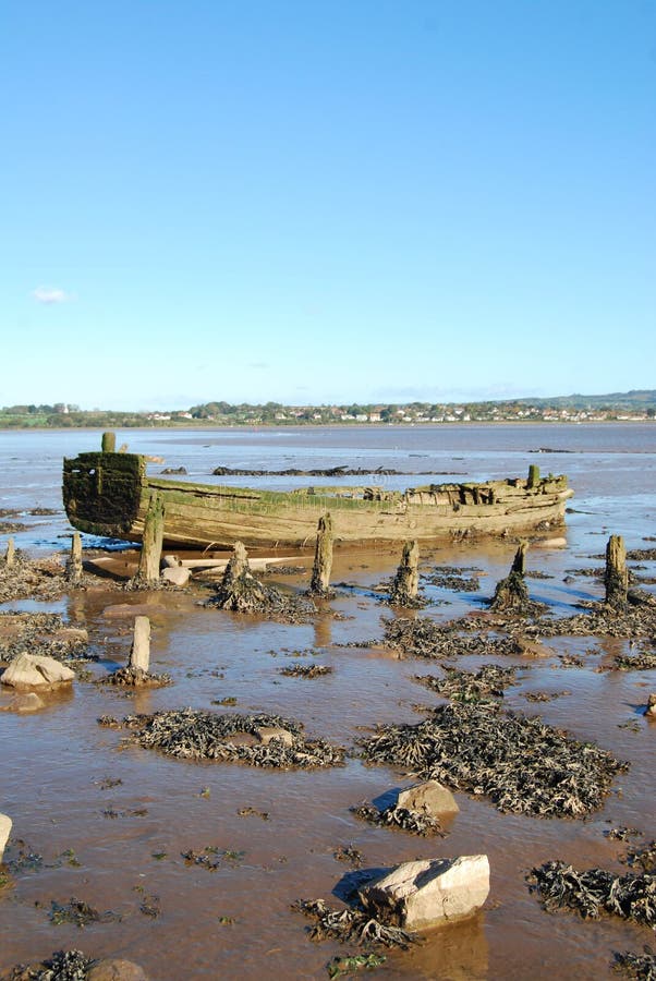 Beached boat stock image. Image of beach, coast, clouds - 27540143