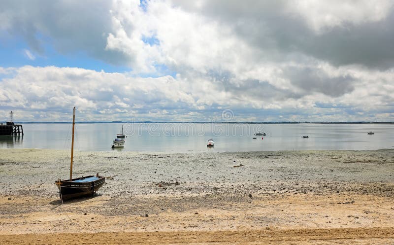 Beached Boats Stranded during Low Tide Stock Photo - Image of quicksand ...