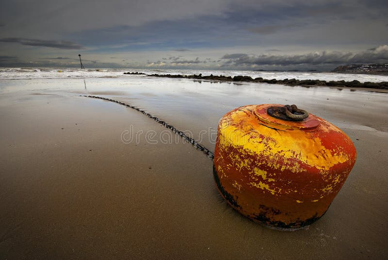 Beached buoy stock photo. Image of moody, danger, yellow - 19404582