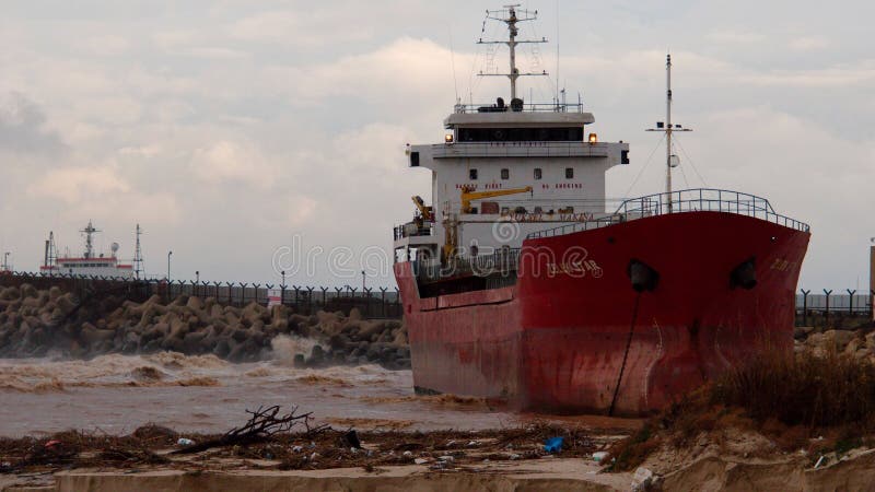 Beached Cargo Ship on the Seashore Editorial Image - Image of vessel ...