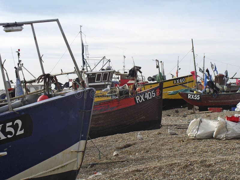Beached fishing boats stock image. Image of seaside, nets - 63133