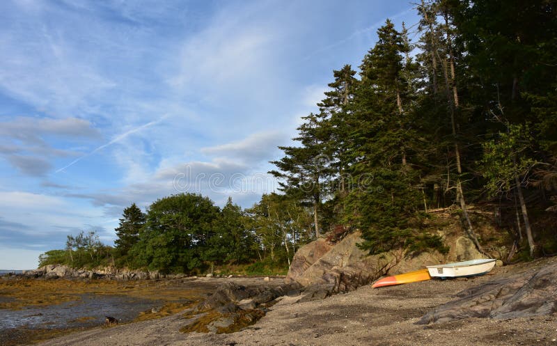 Beached Kayak and Row Boat at Low Tide Stock Photo - Image of outdoors ...