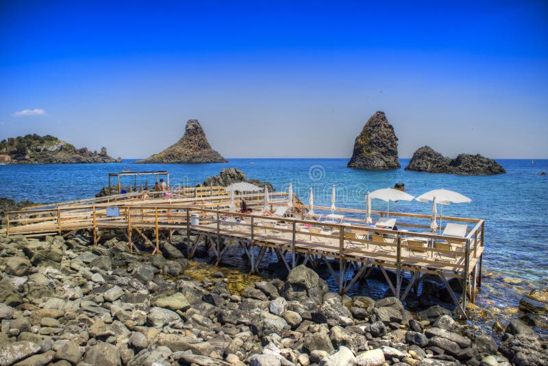 The beaches of Aci Trezza editorial photo. Image of relax - 136705146