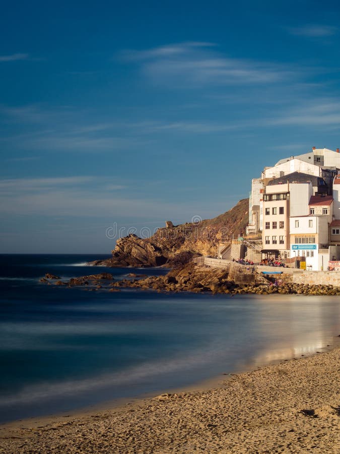 Beaches with Waves and Cliff at Sunset on the Spanish Coast Editorial ...
