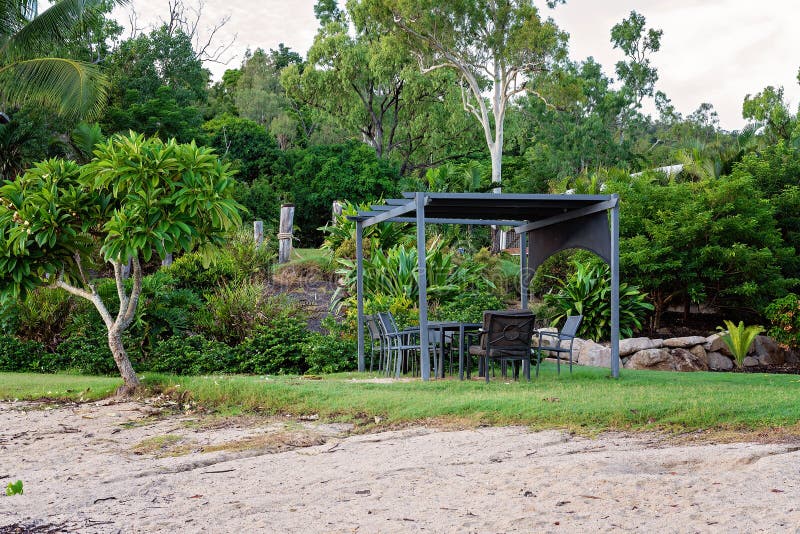 Beachfront Dining Under Shade Stock Image - Image of location, relax ...