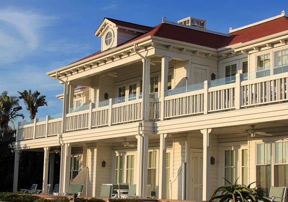 Beachfront House during Sunset Stock Photo - Image of beach, coastline ...
