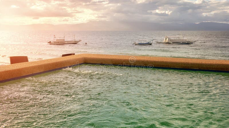Beachfront Pool at Sunset, Selective Focus on the Water, Philippines ...
