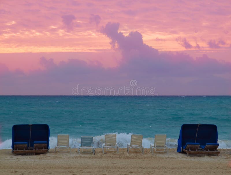 Beachfront at sunset stock photo. Image of vacations - 12704482