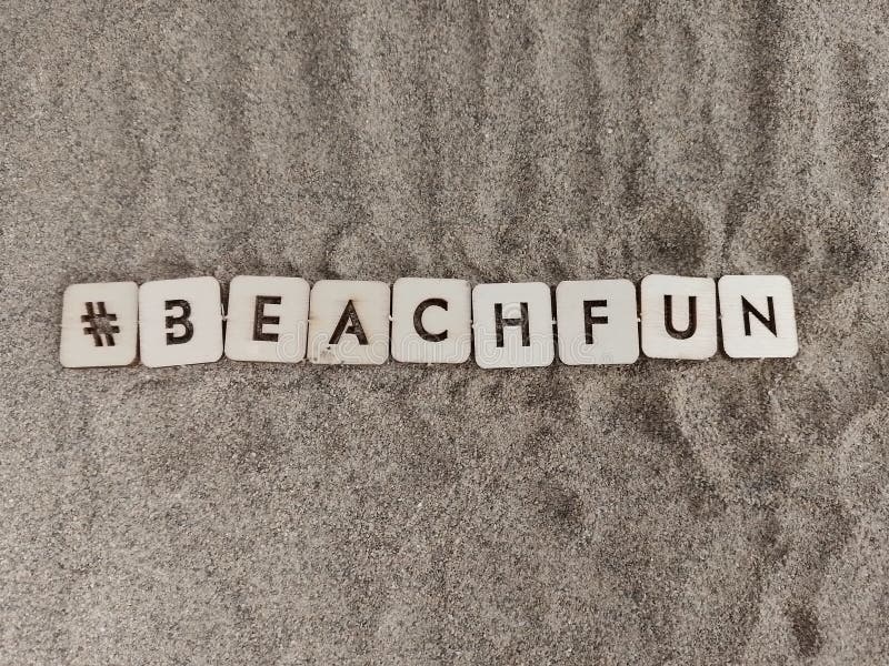 #beachfun Beach Fun Written on Wood Blocks on the Sand Stock Photo ...