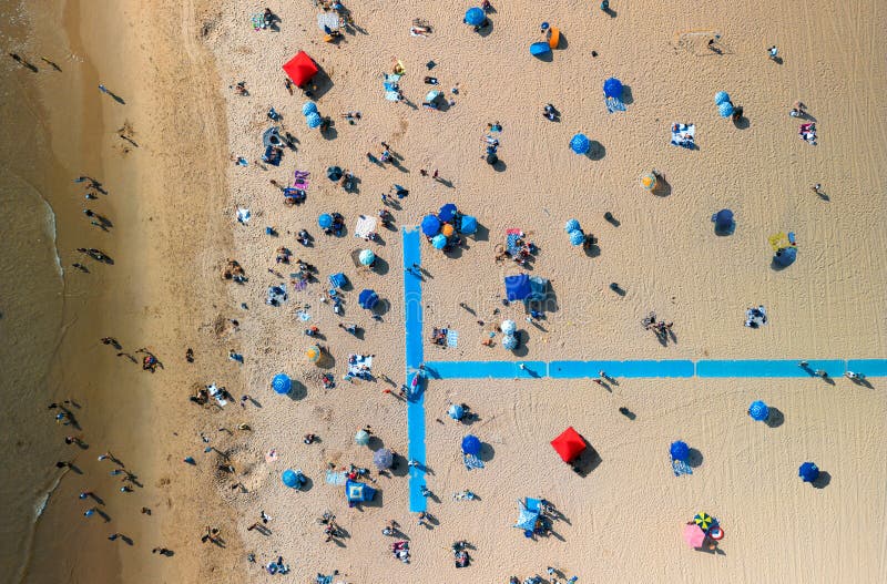 Beachgoers Bathing in the Late Afternoon Sun Stock Photo - Image of ...