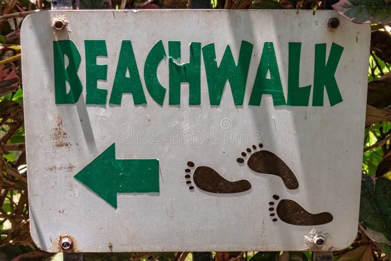 Beachwalk Sign with Footprints and Arrow Stock Image - Image of sign ...