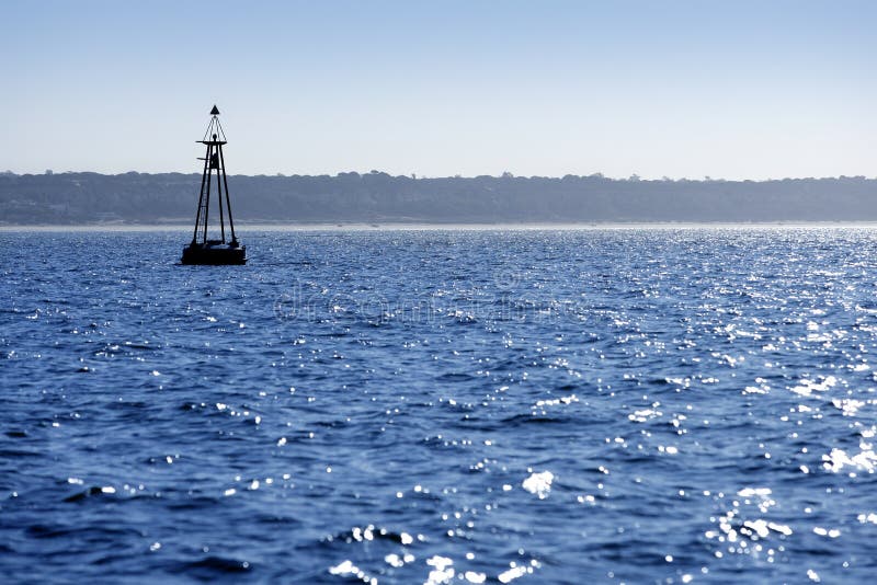 Beacon Floating on Blue Ocean As Guide Help Stock Photo - Image of ...