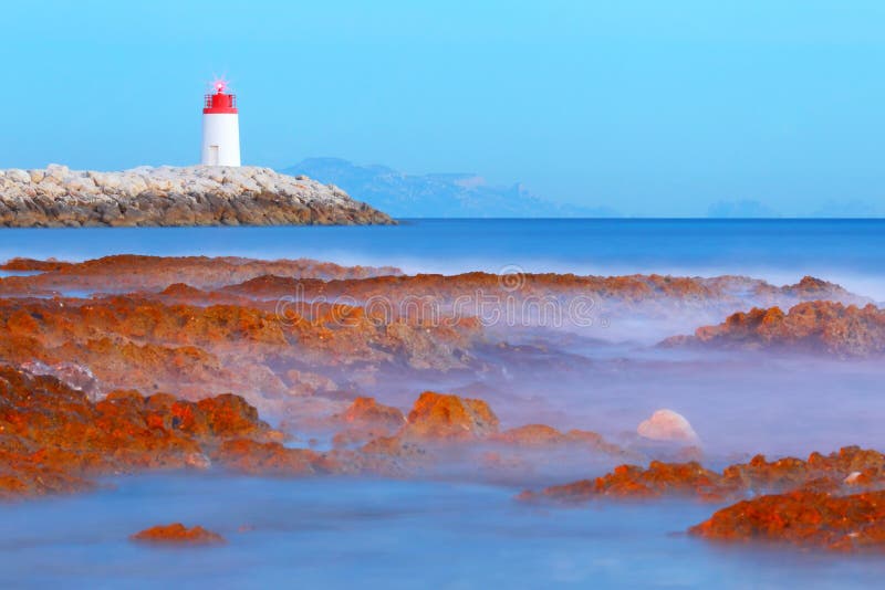 Beacon at the Sea at Sunset Stock Image - Image of beach, safety: 35452257