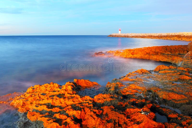 Beacon at the Sea at Sunset Stock Image - Image of seascape, bright ...