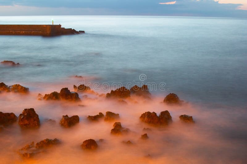Beacon at sunset stock image. Image of choppy, surreal - 630127