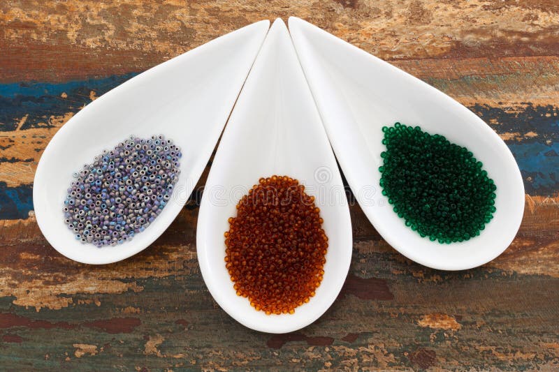 Bead in White Plates on Wooden Table Stock Image - Image of beading ...