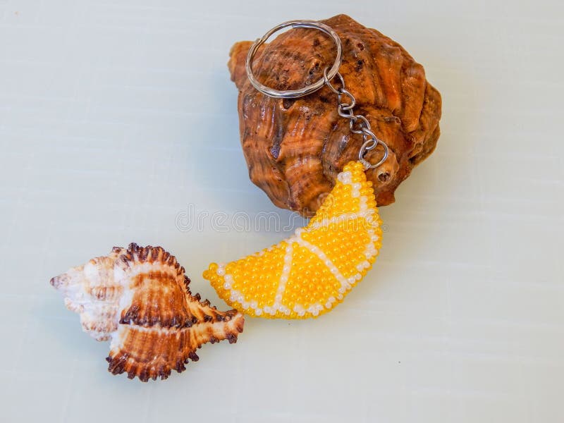 Bead Yellow Key Chain and Shells Stock Photo - Image of craft, beads ...