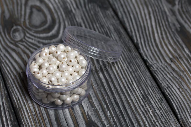 Beads for Needlework. Pearl Color. in a Plastic Jar Stock Image - Image ...