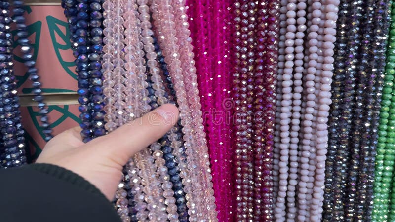 Beads from Various Types of Natural Stones are Trying on a Thread ...