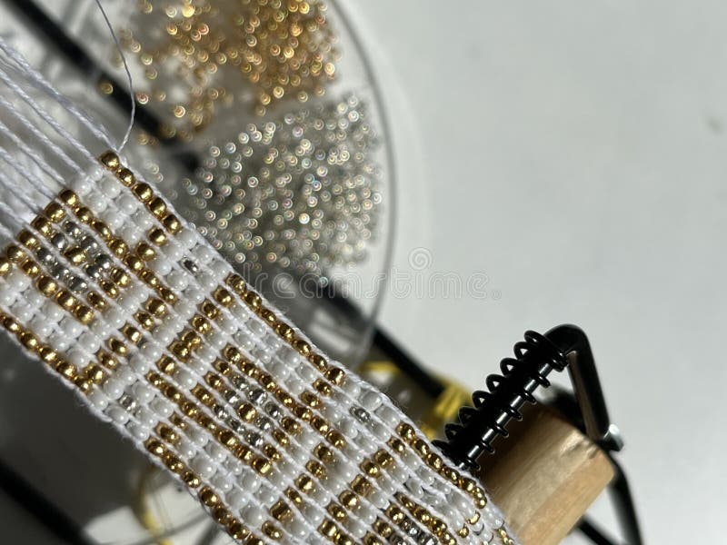 Beadwork. a Product Made of Beads on a Beading Machine Stock Photo ...
