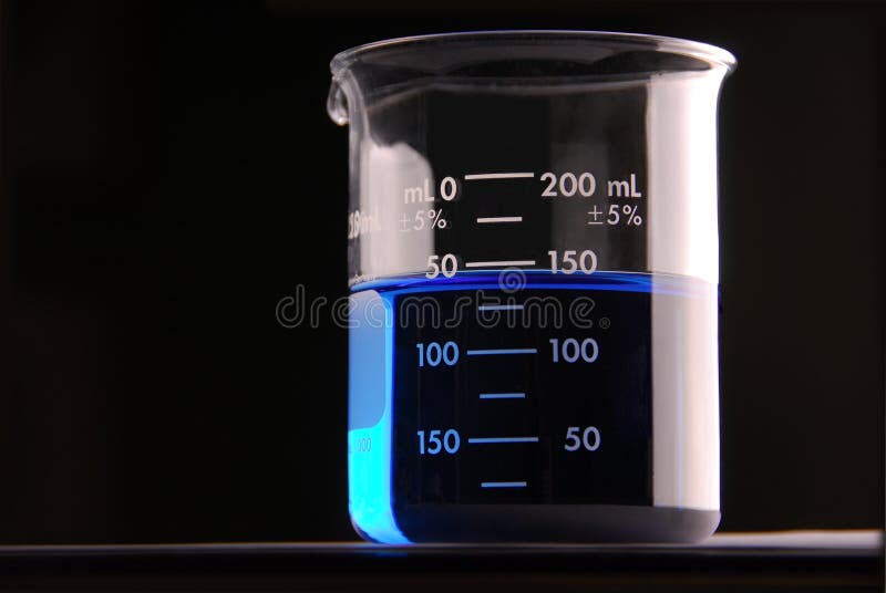 Beaker with blue liquid stock image. Image of laboratory - 3269555