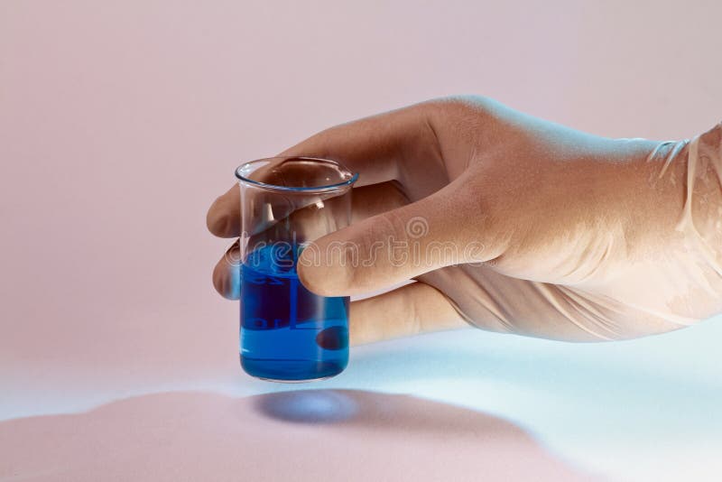 Beaker and hand stock image. Image of chemistry, medical - 27578851