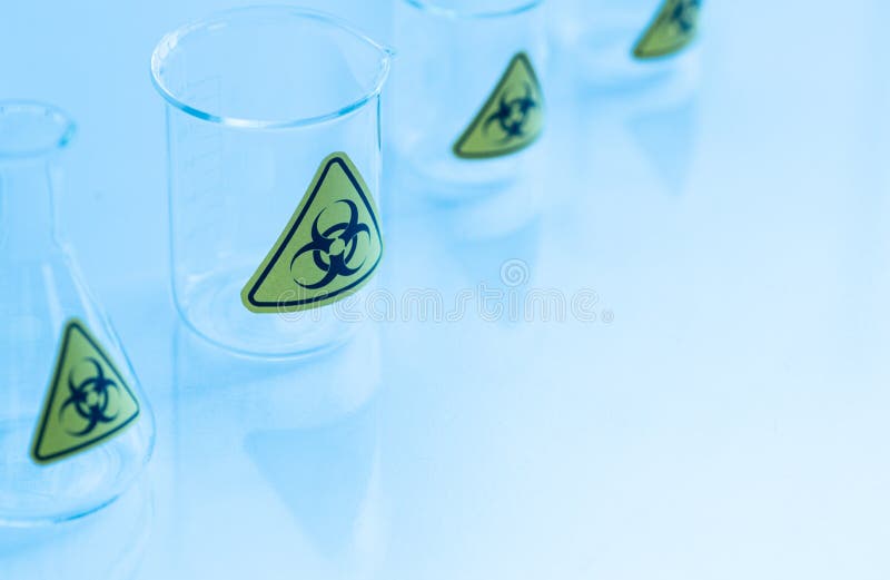 Beaker in Lab with Biological Hazard Warning Stock Image - Image of ...