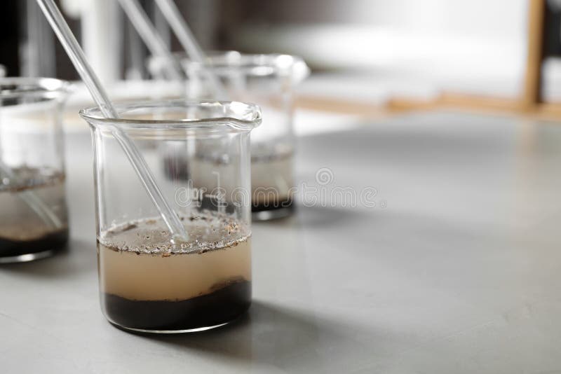 Beaker with Soil Extract on Light Table. Laboratory Analysis Stock ...