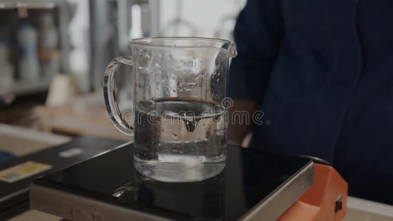 Beaker with Swirling Liquid in Test Device in Laboratory Stock Video ...