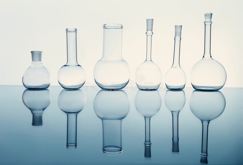 Beakers stock photo. Image of glass, background, beaker - 142963596