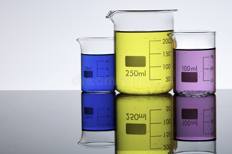 Red and Yellow Beakers stock image. Image of chemical - 3252827