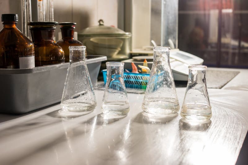 Beakers with Transparent Liquid. Stock Image - Image of beaker ...