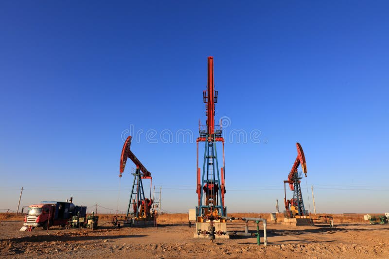 Beam Balanced Pumping Unit in Oilfield Stock Photo - Image of landscape ...