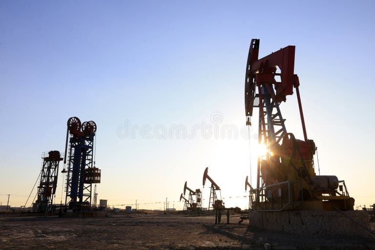 Beam Balanced Pumping Unit Under the Setting Sun Stock Image - Image of ...