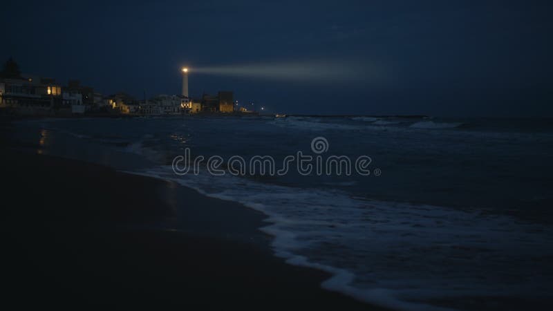 Beam of Light Cast by the Lighthouse at Night Stock Video - Video of ...