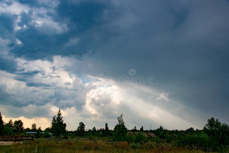 Beam of Light through the Clouds. Rays of Light Shining through Clouds ...