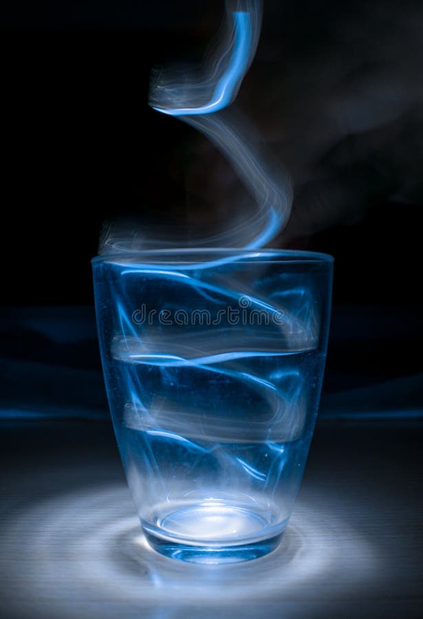 Beam of light in a glass stock photo. Image of drink - 136985112