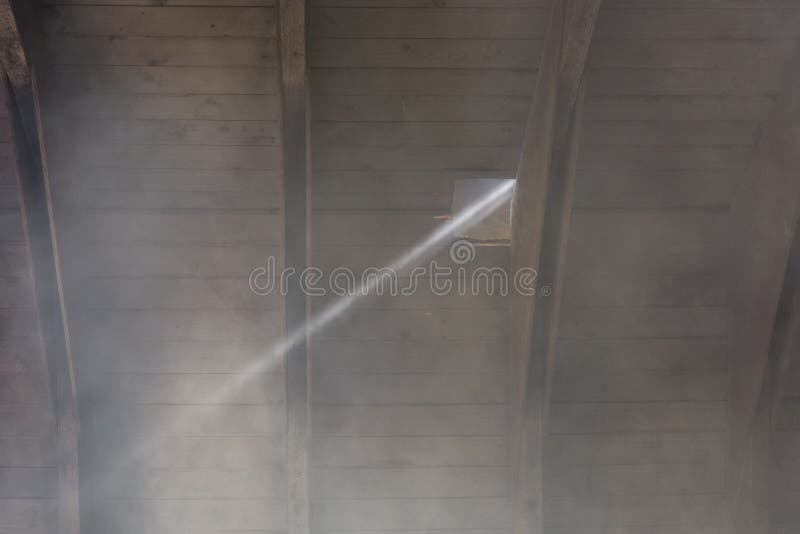 A Beam of Light Shining through a Hole in the Roof Stock Image - Image ...