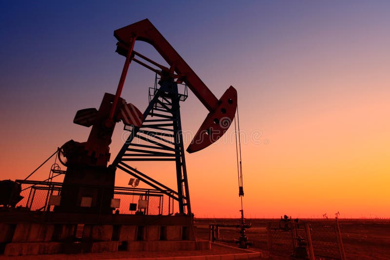 The Beam Pumping Unit is Homework, Sunset in Oil Field. Oil Pump Oil ...