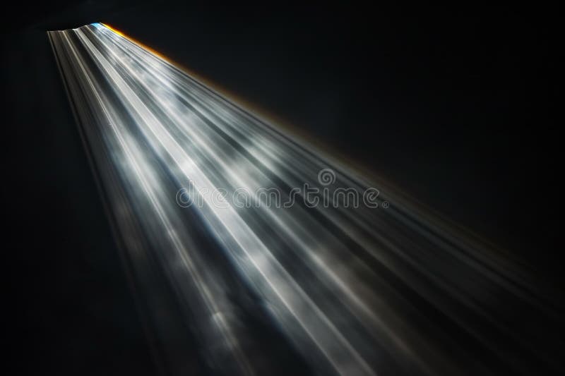 A Beam of White Light Shines Down from the Top Left Corner, Creating an ...