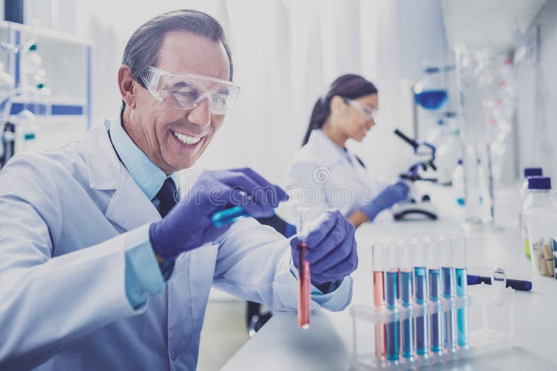 Beaming Elderly Bioengineer Wearing Gloves Stock Photo - Image of ...