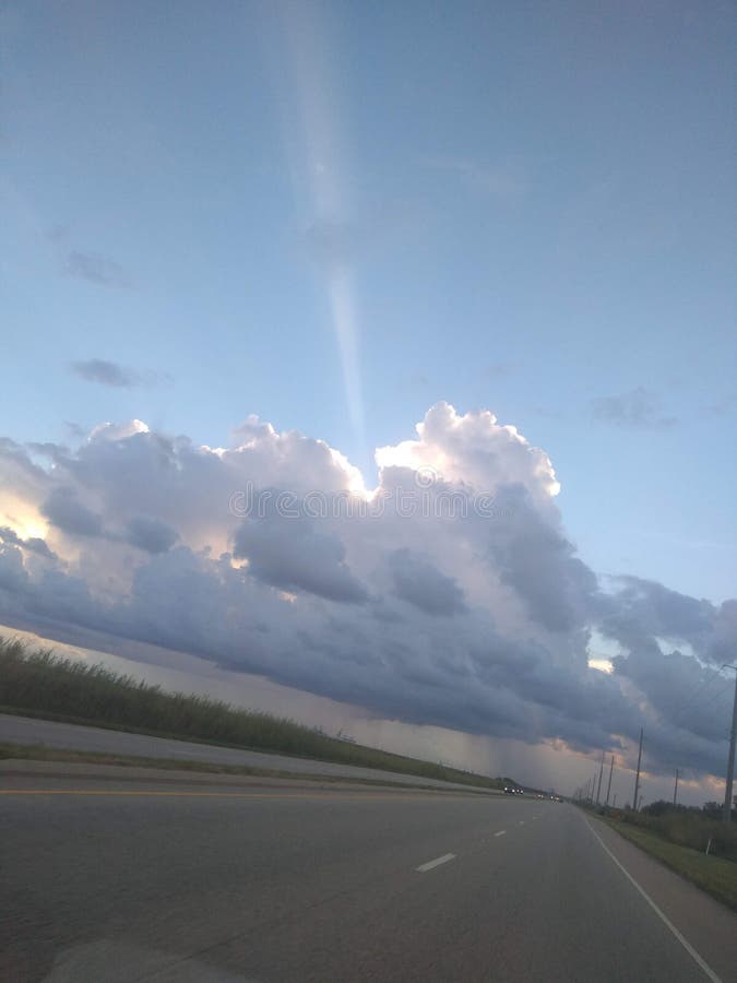 Beaming Light from the Clouds Stock Photo - Image of like, straight ...