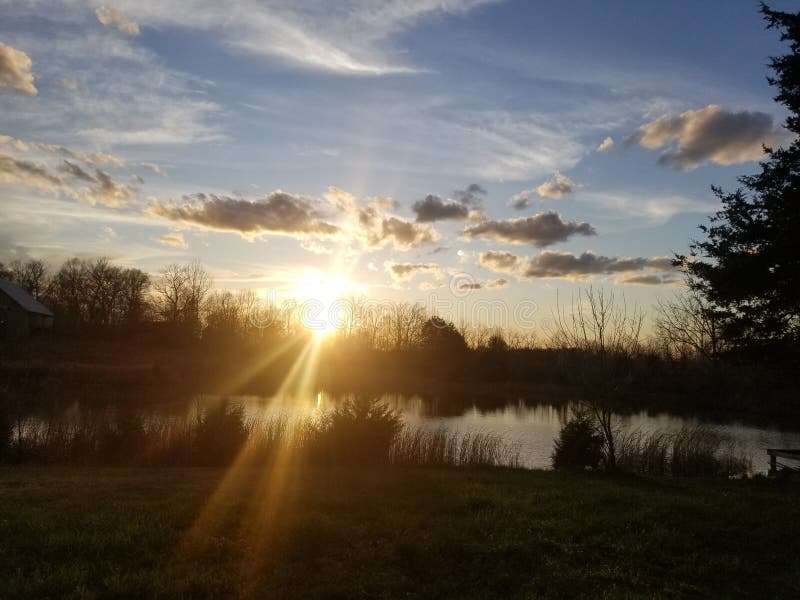 Rays Of Sun Beaming Through Clouds In The Carpathian Mountains Stock ...